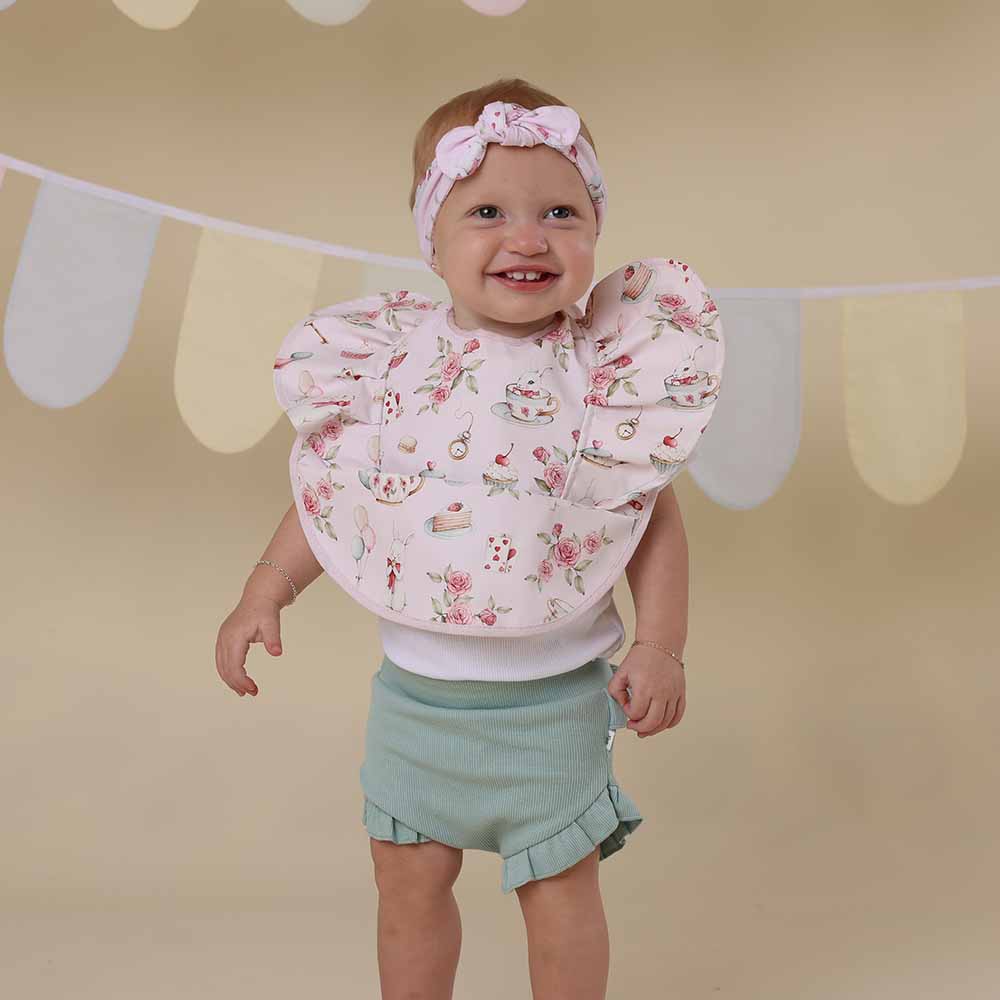 Alice’s Tea Party Waterproof Snuggle Baby Bib With Frill | Snuggle Hunny